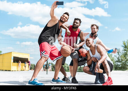 Basketball players taking a selfie Stock Photo - Alamy