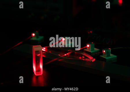 Laser experiment in photonics laboratory Stock Photo - Alamy