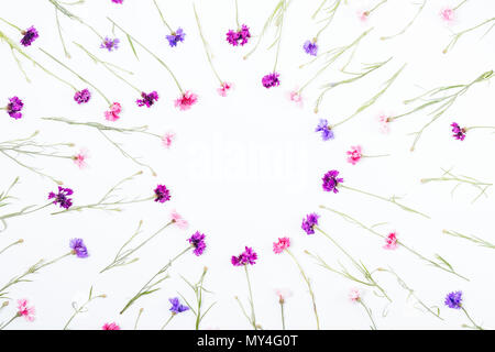 Round frame made of textile pink confetti in a heart shape. Monochrome ...