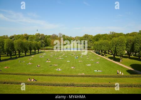 People spend the day in a public swimming pool in Frankfurt, Germany ...