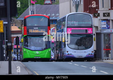 Buses on Eastgate in Leeds City Centre Stock Photo - Alamy