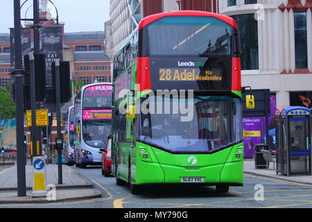 Buses on Eastgate in Leeds City Centre Stock Photo - Alamy