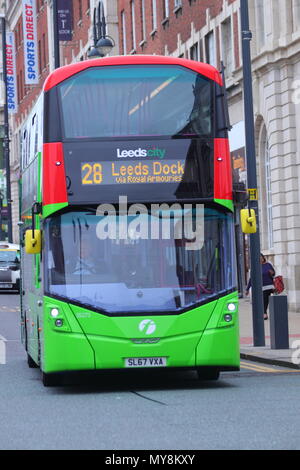 Buses heading down the Headrow in Leeds City Centre Stock Photo - Alamy