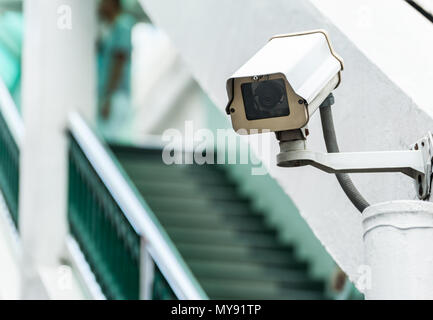 CCTV camera or surveillance operating above stair Stock Photo - Alamy