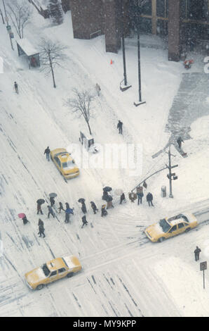 Pedestrians Crossing Street in Snowstorm, NYC 1990s Stock Photo - Alamy