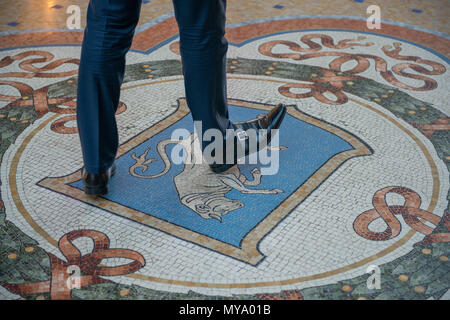 The floor mosaic bull of Galleria Vittorio Emanuele in Milan, Italy ...