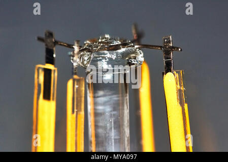 Fragment of the LED lamp under the microscope. The central glass ...