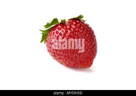 Close up of one cut strawberry on a pile of fresh ripe strawberries ...