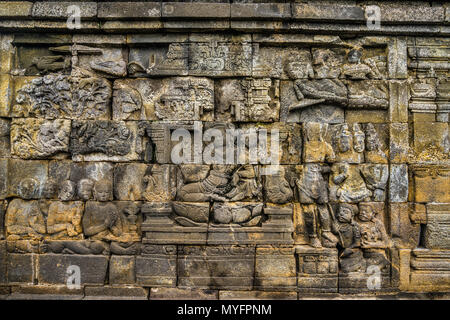 bas relief panel on a balustrade of 9th century Borobudur Buddhist ...