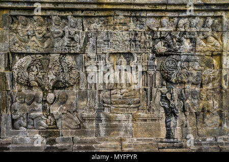 bas relief panel on a balustrade of 9th century Borobudur Buddhist ...