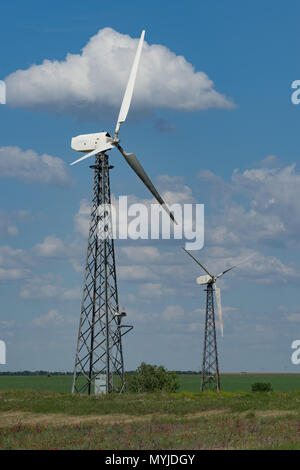 Panorama of wind farms against the blue sky with clouds Stock Photo - Alamy
