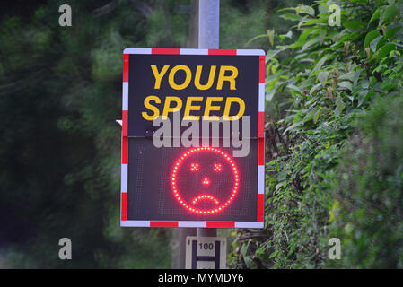 digital speed warning sign showing happy face when passing drivers are ...