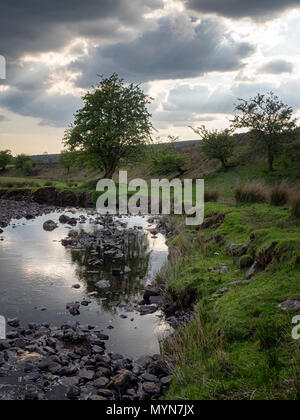 Dramatic skies over the river Hepste (Afon Hepste) at Tir-yr-onen, near ...