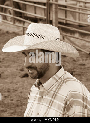 Man with beard in dirty dusty shirt looks exhausted. Builder, plasterer ...