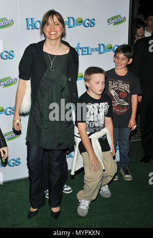 Lucy Lawless and kids - Hotel For Dogs Premiere at the Grove Theatre In ...