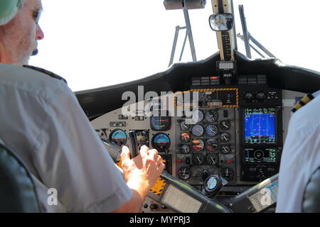 Inside the cockpit of a Skybus Twin-Otter en route to St Marys, Isles ...