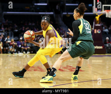 Seattle Storm forward Alysha Clark, front, gets tangled up with Indiana ...