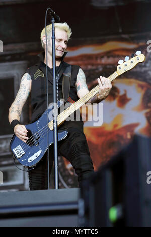 Mike Dirnt of Green Day performs at the Innings Festival at Raymond ...