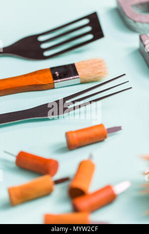 Variety of grilling tools on blue background Stock Photo - Alamy