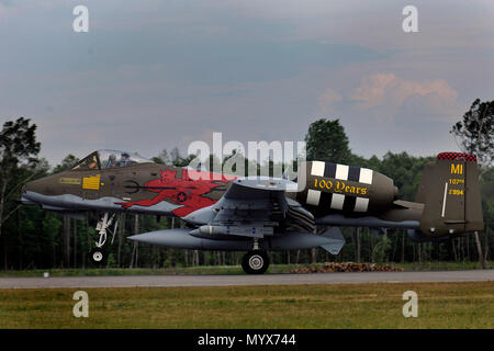 LIELVARDE AIR BASE, Latvia-- Master Sgt. Steven Haven aims a radio ...