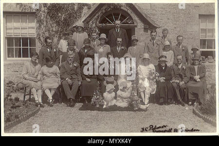1920's postcard photo of wedding group,bride, bridegroom with the vicar ...