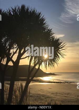 The sun rises at Langland Bay, Swansea as the air temperature struggles ...