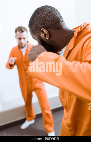 multicultural prisoners fighting in prison cell Stock Photo - Alamy