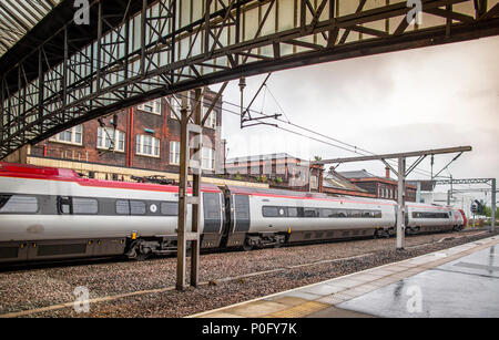 Train station at Stoke on Trent where travellers wait for a virgin ...