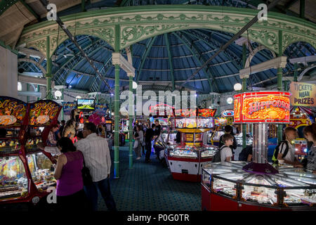 Visitors to Brighton enjoying the pier Stock Photo - Alamy