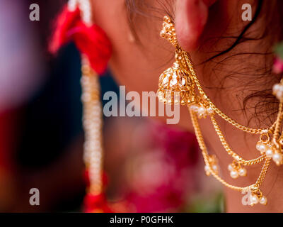 Traditional Indian Hindu family ear piercing ceremony Stock Photo - Alamy