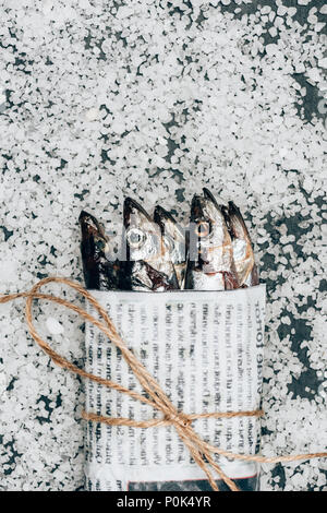 Fish Wrapped In Newspaper Stock Photo - Alamy