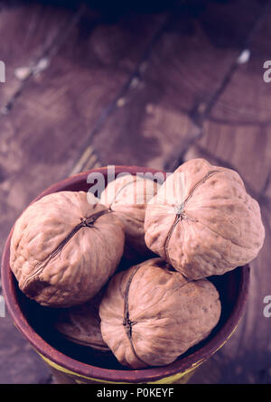 a series of walnut still lifes in vintage color Stock Photo - Alamy