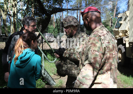 Brig. Gen Eric Strong speaks to the attendees and family members during ...