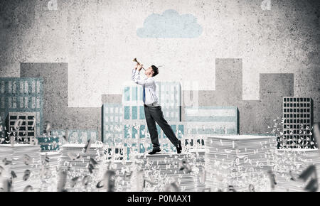 Happy businessman playing fife Stock Photo - Alamy
