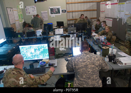 Soldiers in the 113th Engineering Brigade Headquarters Command work in ...