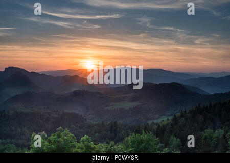 Green hills of Pieniny National Park and snowy Tatra Mountains in ...