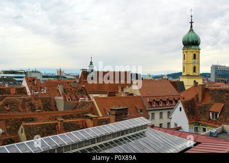 Franziskanerkirche and red roofs of old city aerial view, Graz, Austria ...