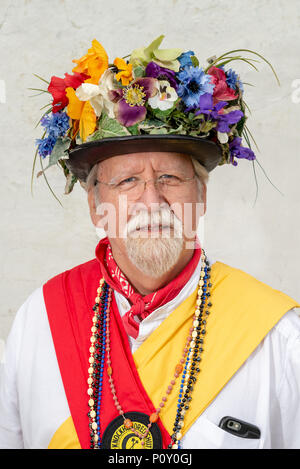 A Morris dancer wearing a colourful hat is pictured at the 2012 Stock ...