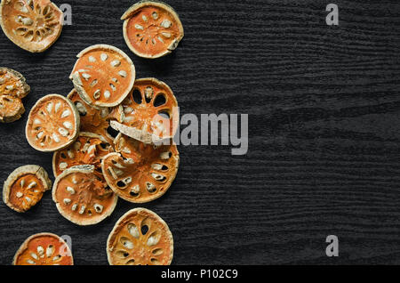 closeup view of ripe bael fruits, also known as bengal quince, golden ...