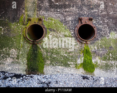 Beach drain pipe Stock Photo - Alamy