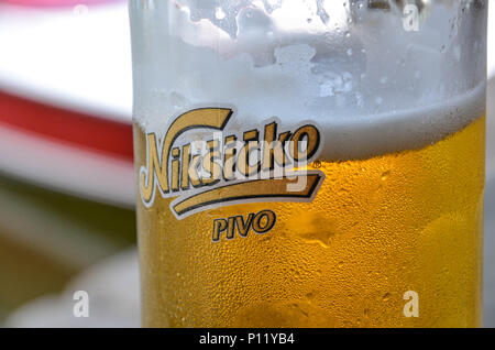 A pint glass of Nikšićko lager beer, Old Town, Kotor, Bay of Kotor ...