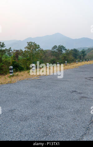 roadside pillar in the surface of natural road Stock Photo - Alamy