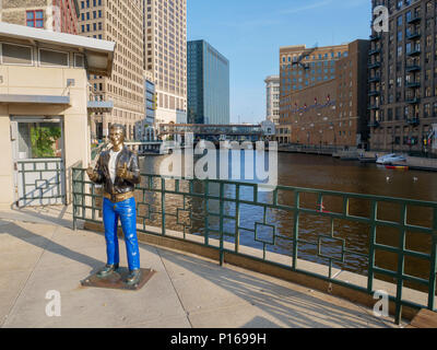 The Bronze Fonz statue by Gerald P Sawyer, Milwaukee Riverwalk. Depicts ...