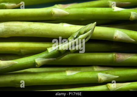 Texture of green asparagus view front Stock Photo - Alamy