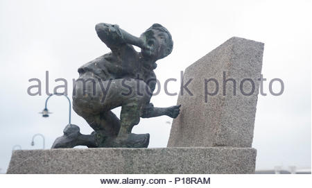 Hans Brinker. Statue of a Dutch boy who saves his country by putting ...