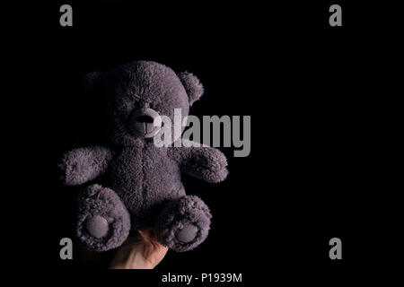 teddy bear in handcuff. Child abuse and violence concept Stock Photo ...