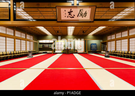 Traditional Japanese temple hall interior with tatami mats and painted ...
