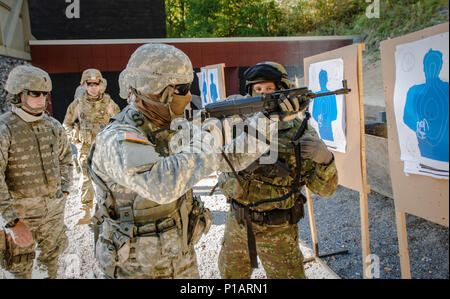 An Indiana National Guard Military Police Soldier practices shooting ...