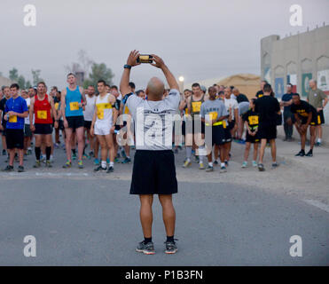 Command Sgt. Maj. Theodore Rivera, left, command sergeant major of the ...