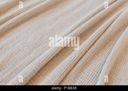Soft beije fabric with folds background texture close-up Stock Photo ...